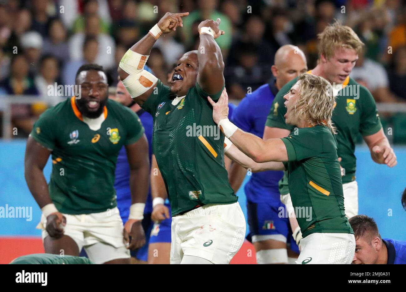 South Africa's Mbongeni Mbonambi celebrates with teammate Faf de Klerk ...