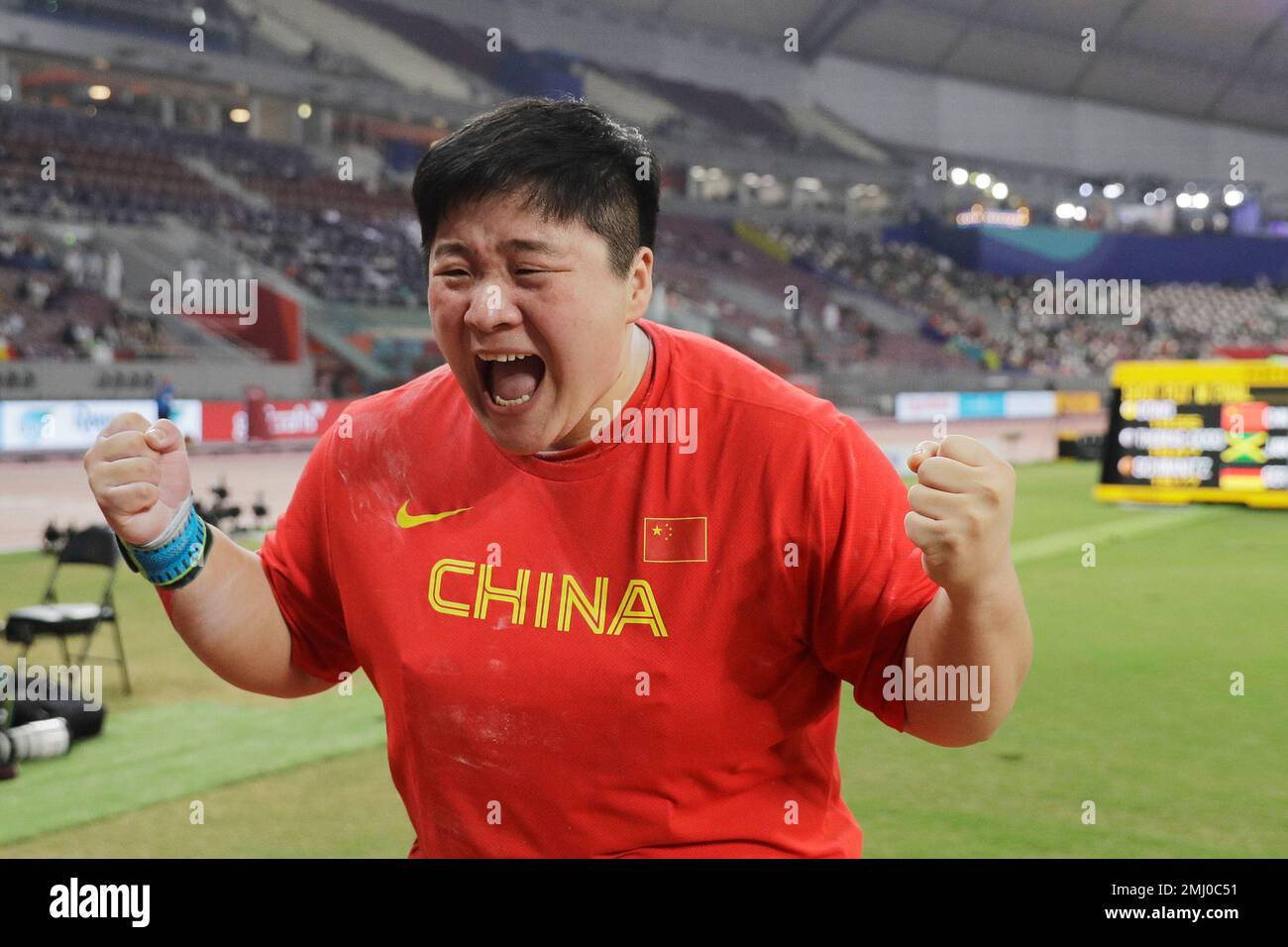 Lijiao Gong, of China, celebrates winning the gold medal in shot put at ...