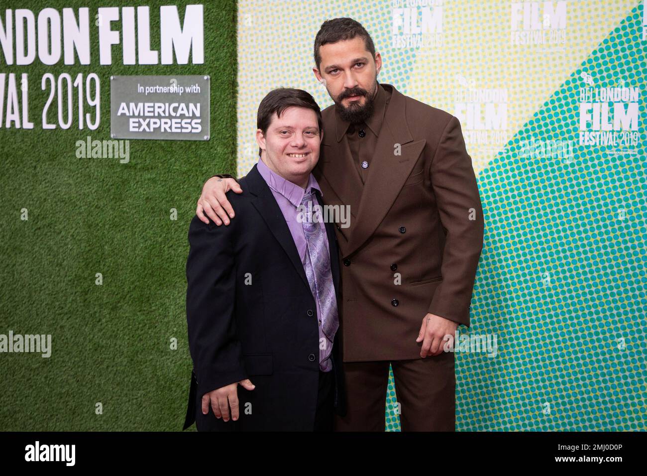 Actors Zack Gottsagen, left, and Shia LaBeouf pose for photographers ...