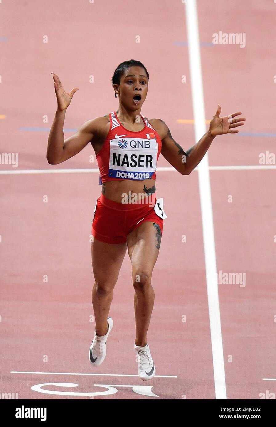 Salwa Eid Naser, of Bahrain, wins gold in the women's 400 meter final ...