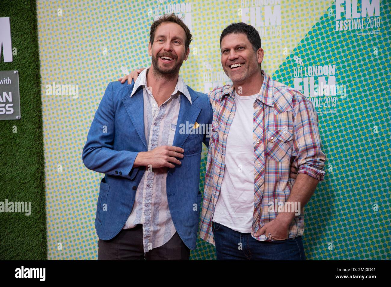 Tyler Nilson, left, and Michael Schwartz pose for photographers upon ...