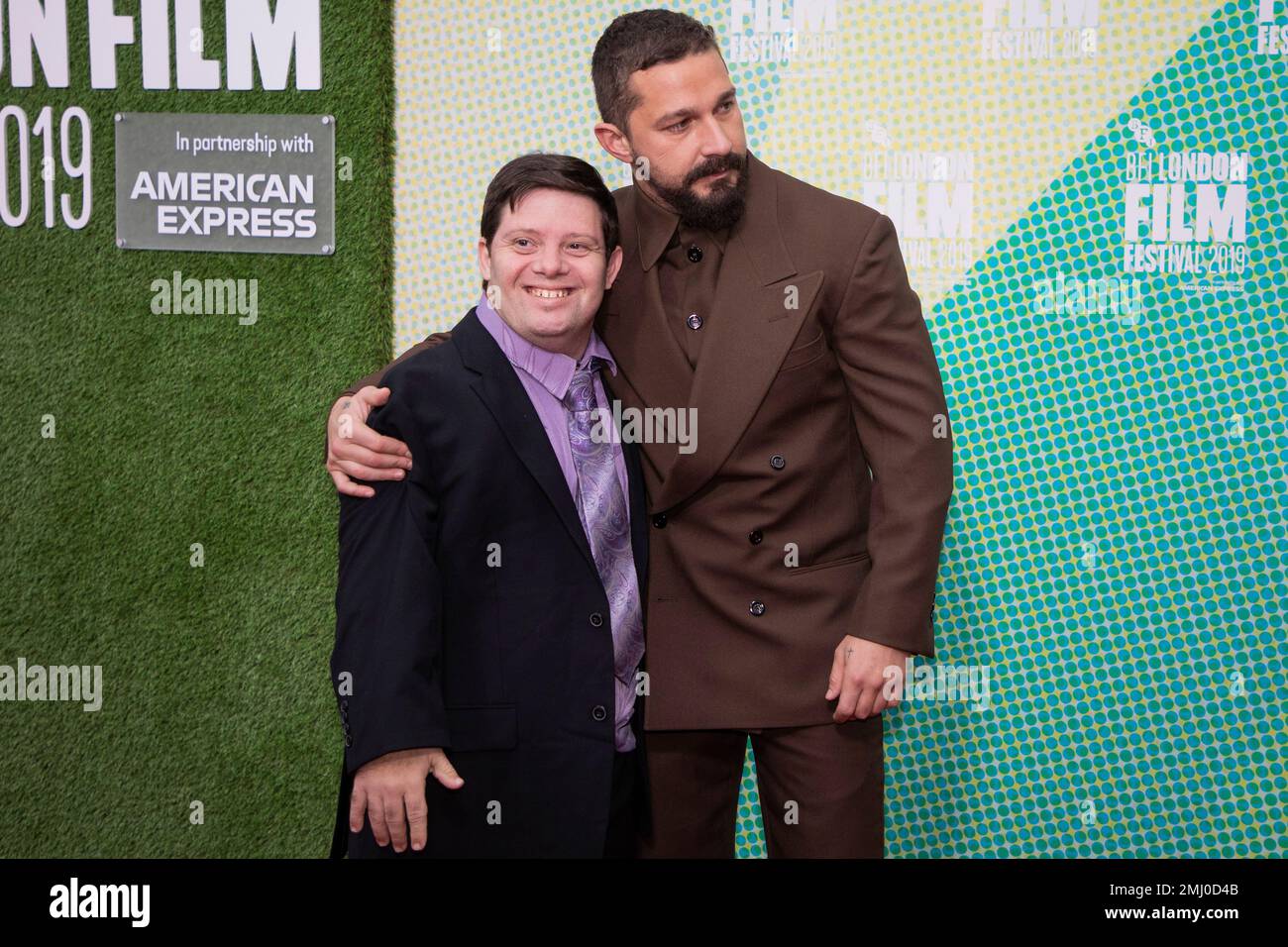 Actors Zack Gottsagen, left, and Shia LaBeouf pose for photographers ...