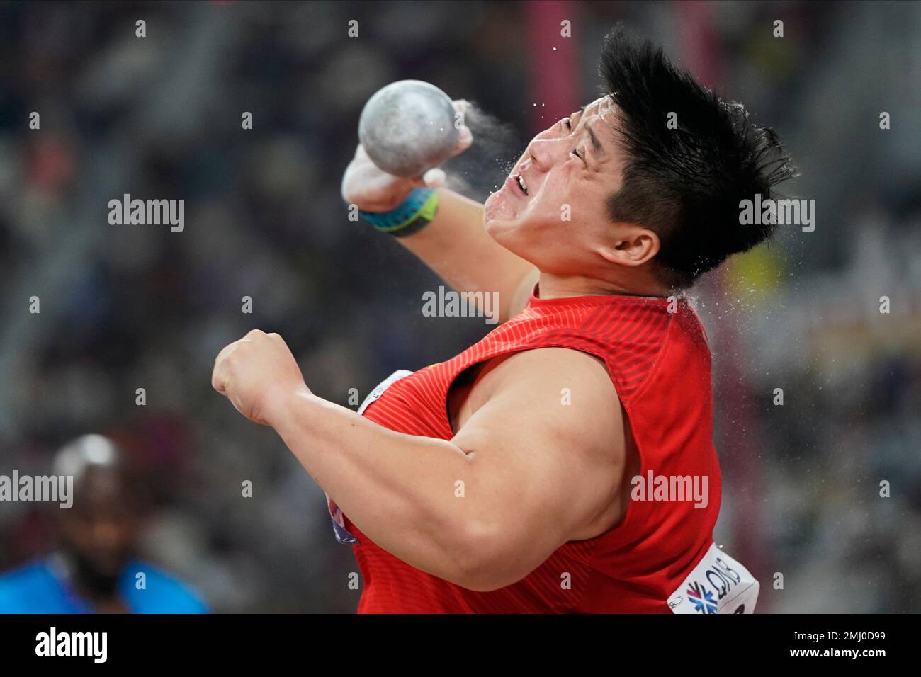 Lijiao Gong, of China, competes in the women's shot put final at the ...