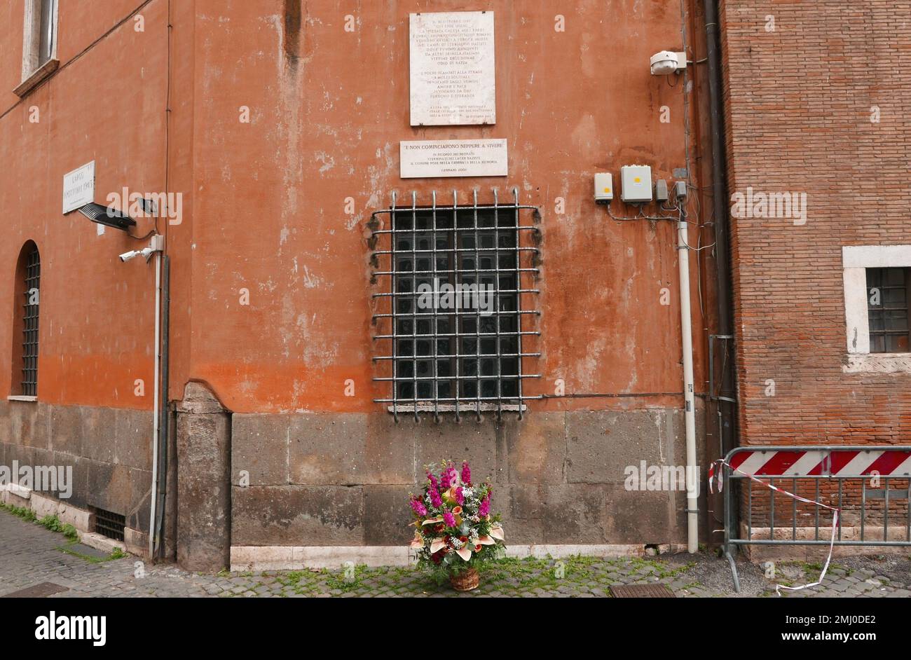 Rome, Italy. 27th Jan, 2023. Flowers under a memorial stone in the ...