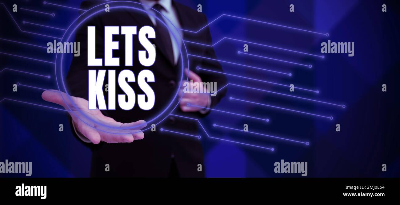 Text caption presenting Lets Kiss. Word Written on Sign of love ...