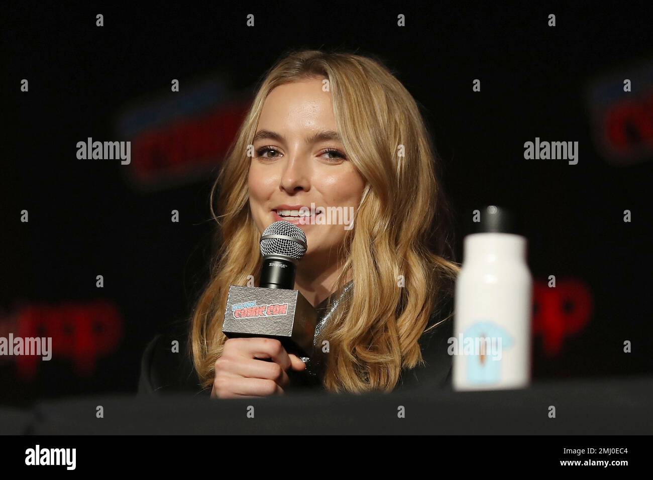Jodie Comer speaks on stage during the 20th Century Fox Panel: An Insider's Look at "The King's ...