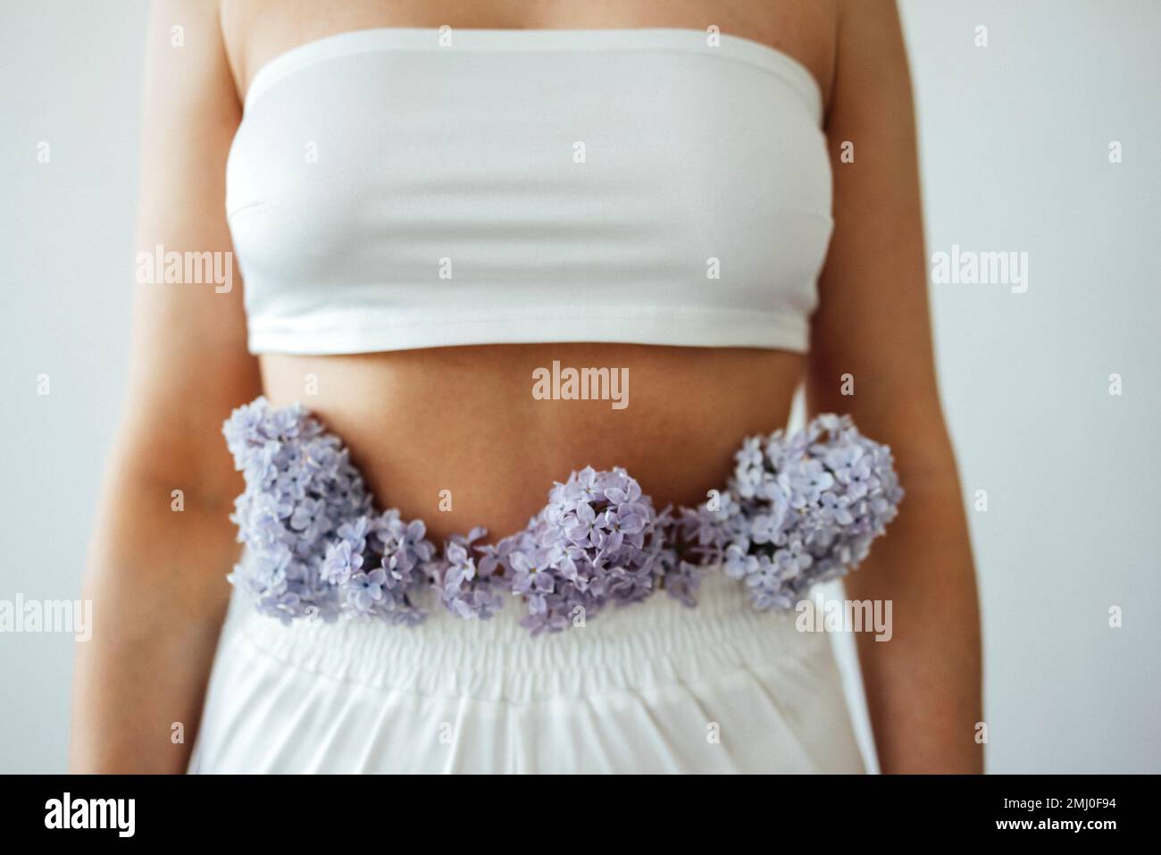 Close Up Of Beautiful Curvy Young Woman In A White Bra And Pants With