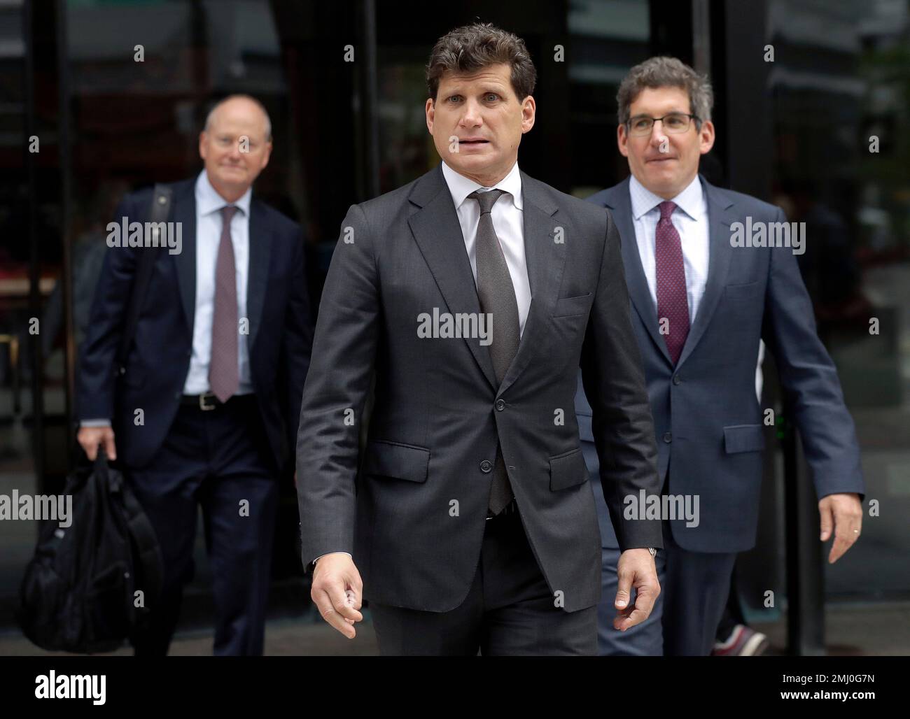 Gordon Caplan departs federal court, Thursday, Oct. 3, 2019, in Boston ...