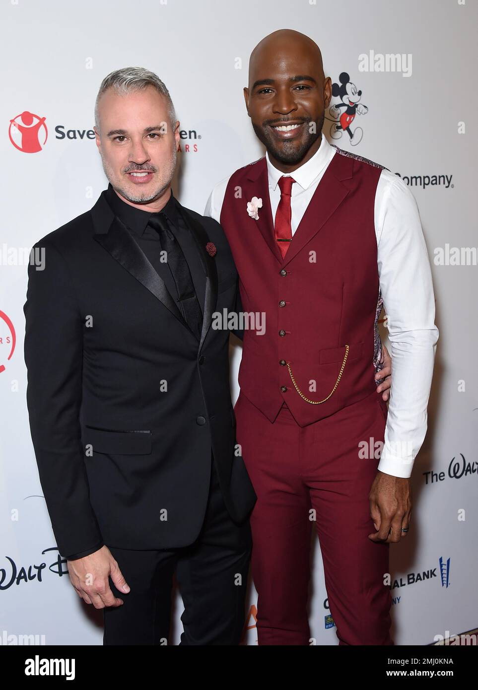 Ian Jordan, left, and Karamo Brown arrive at the Save the Children ...
