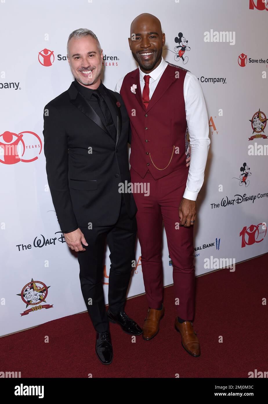Ian Jordan, left, and Karamo Brown arrive at the Save the Children ...