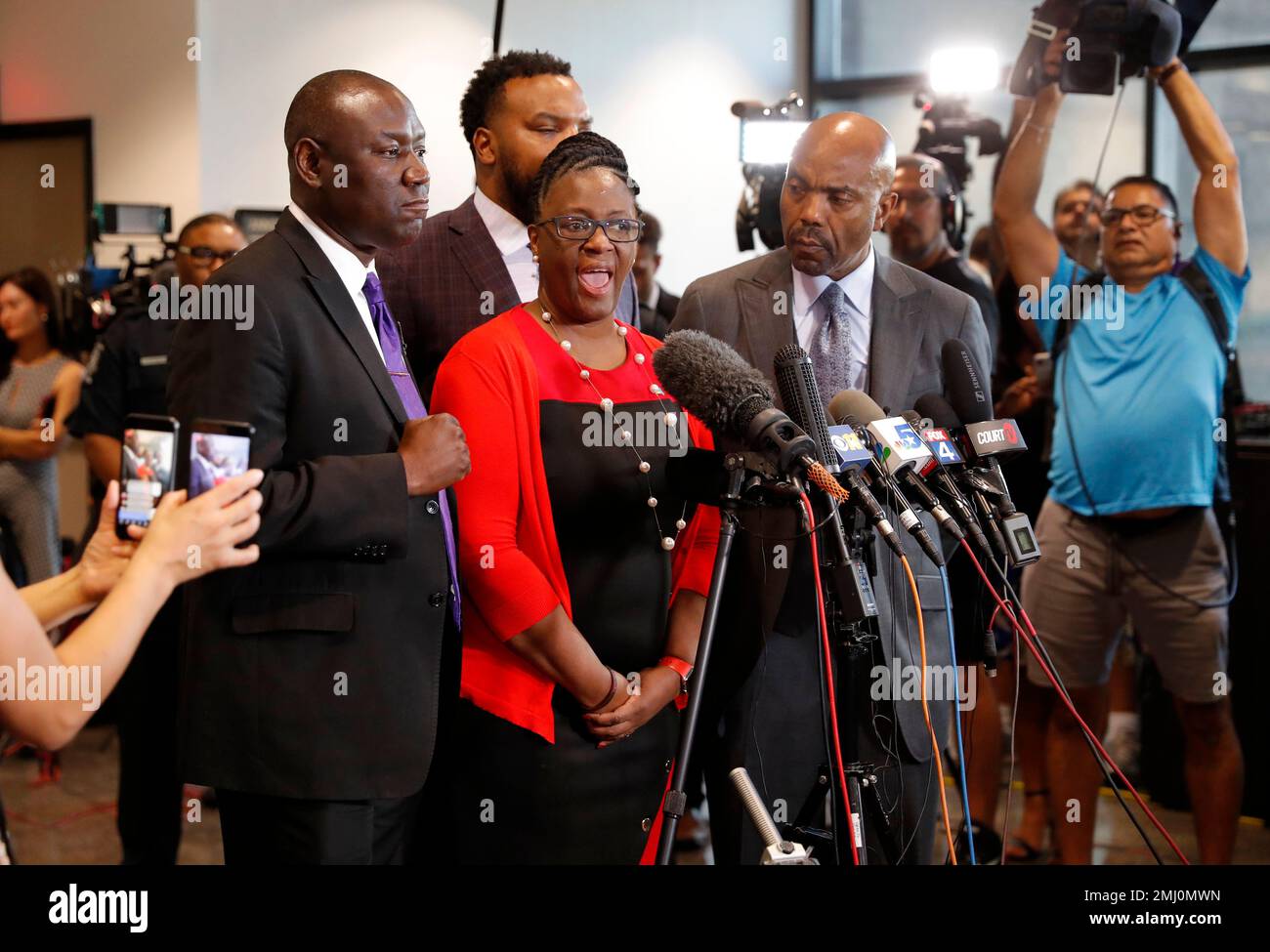 Allison Jean, center, mother of Botham Jean, makes comments during a ...