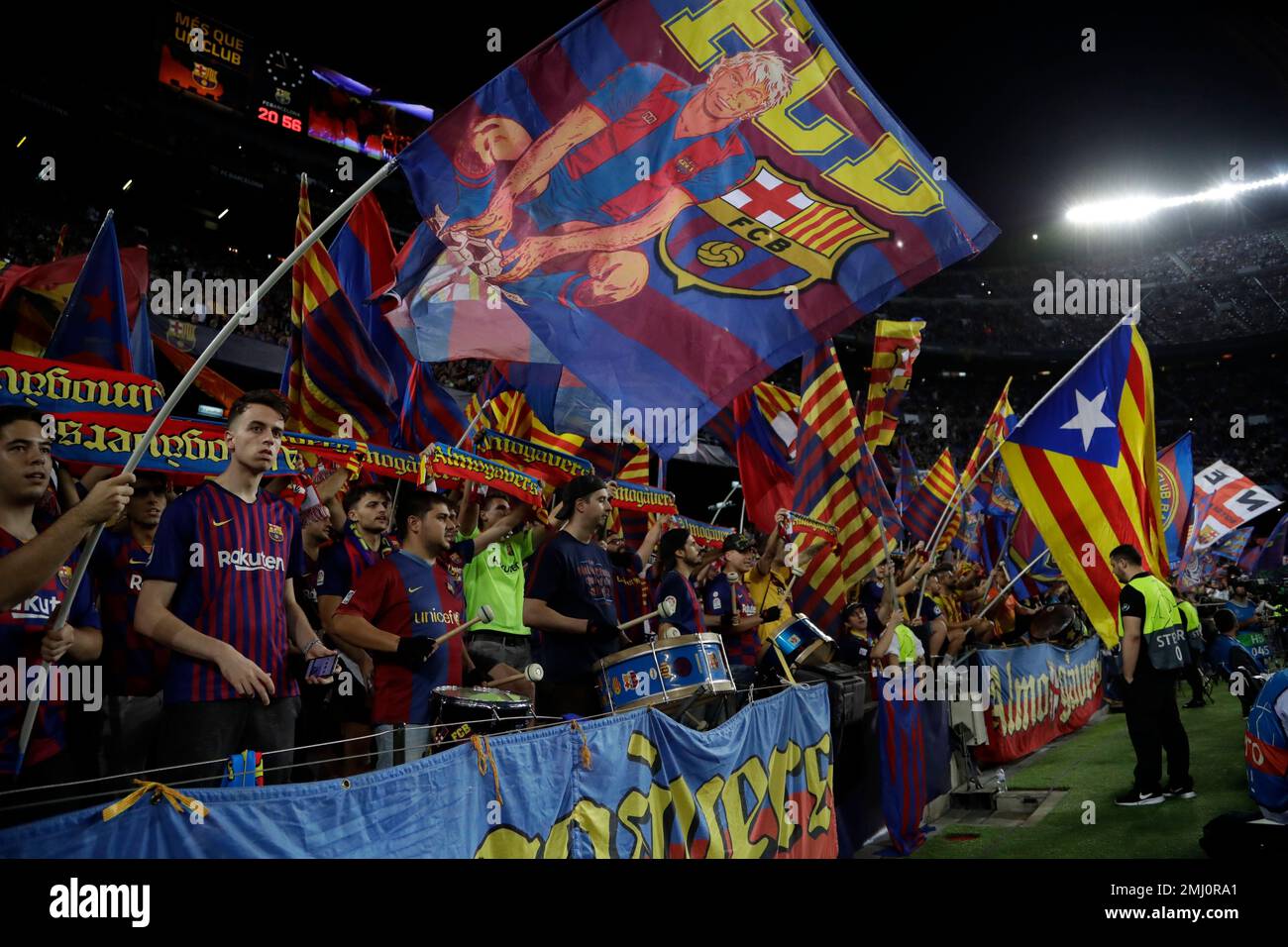 Barcelona fans cheer for their team ahead of the group F Champions ...