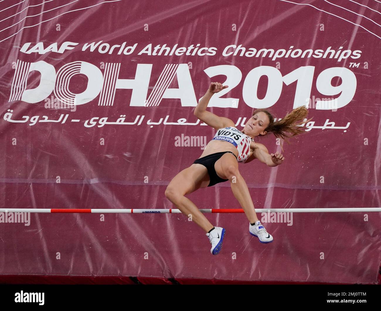 Noor Vidts, of Belgium, clears the bar during the high jump in the ...