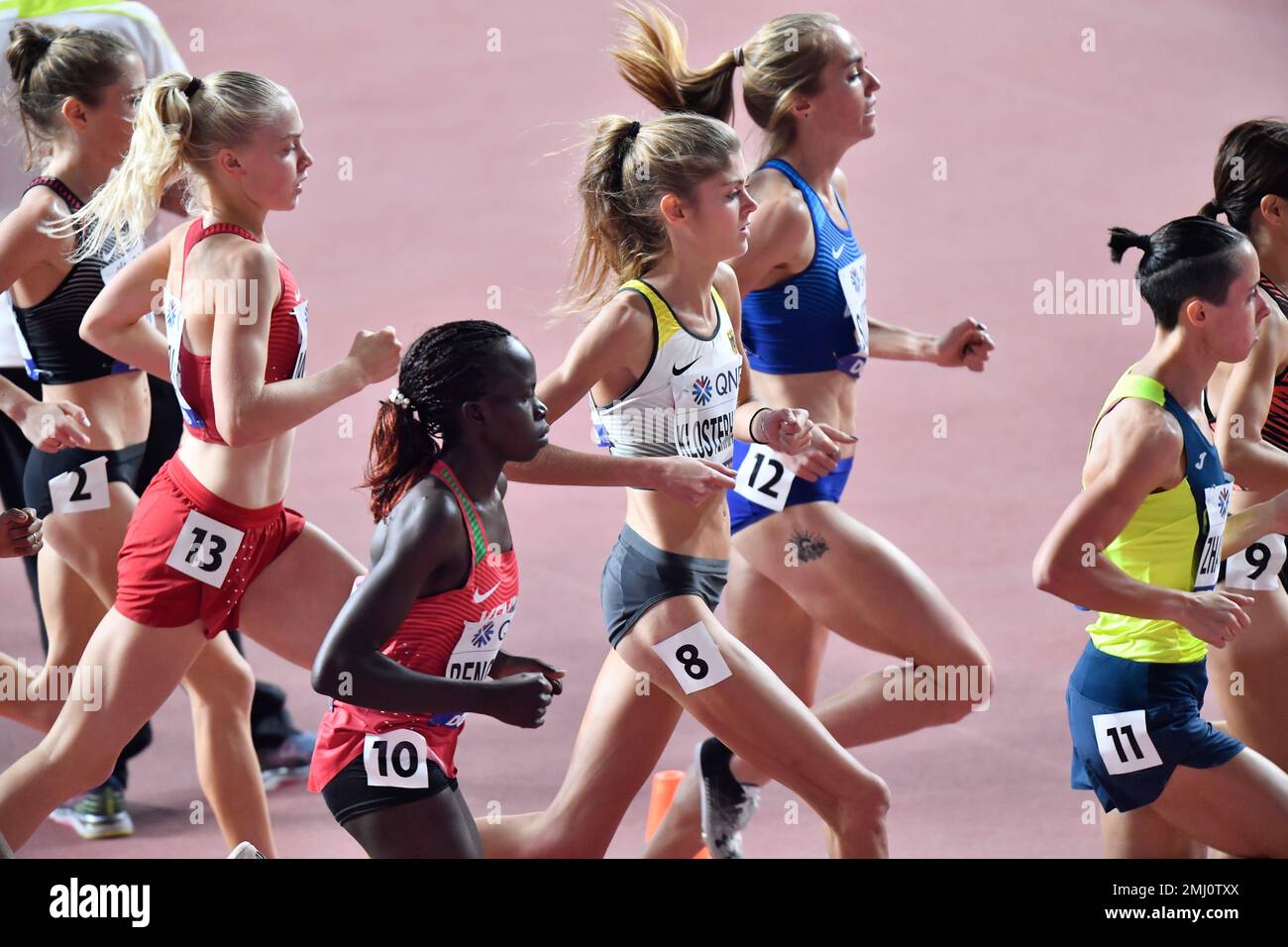 Konstanze Klosterhalfen, of Germany, center with number 8, competes in ...