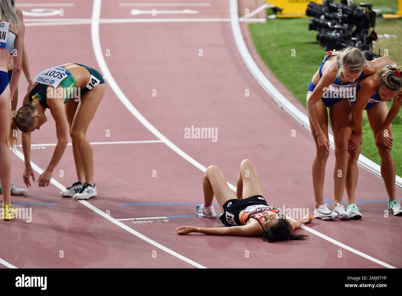 Dominique Scott, of South Africa, left, Nozomi Tanaka, of Japan, center ...