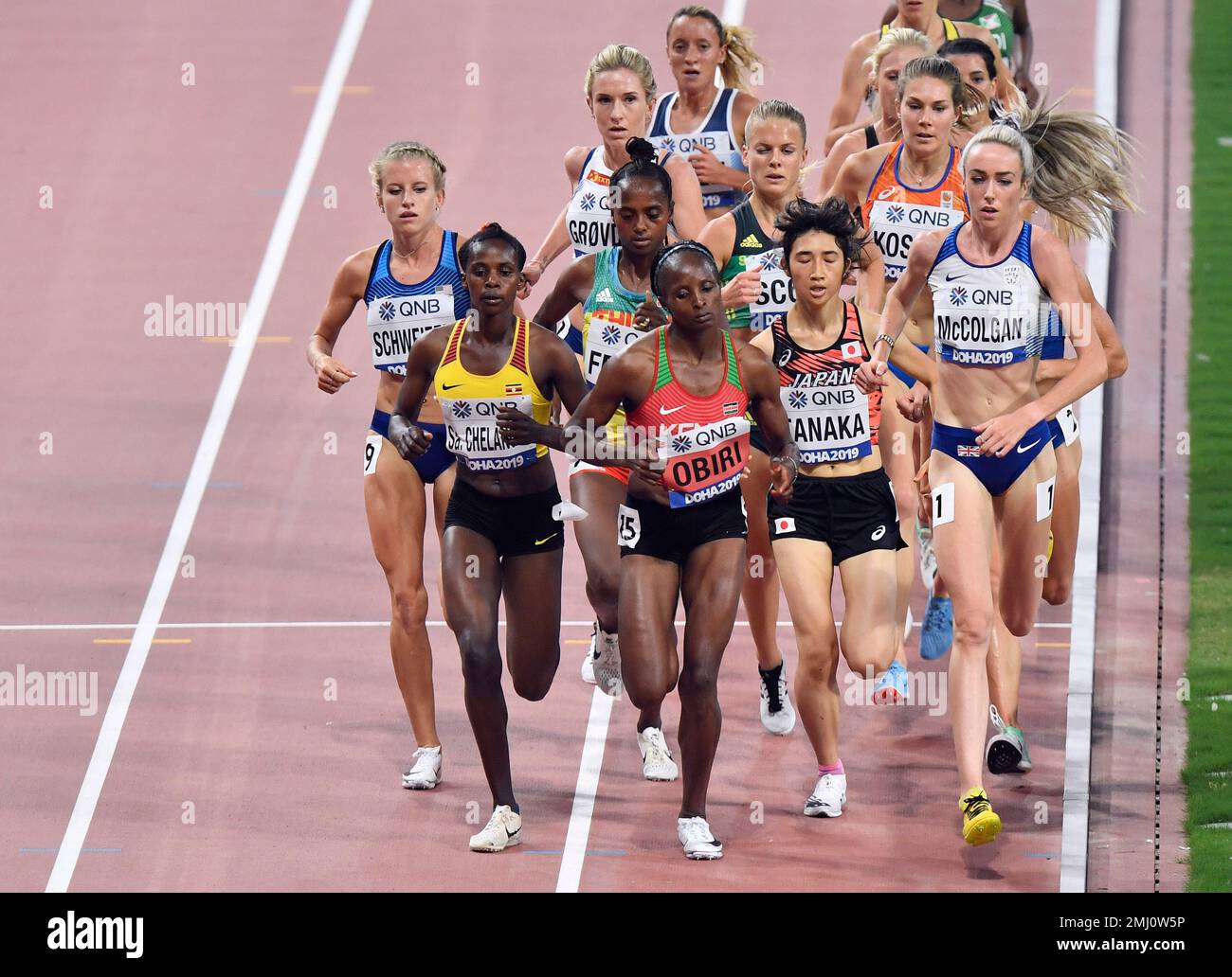 Karissa Schweizer, of the United States, Sarah Chelangat, of Uganda ...