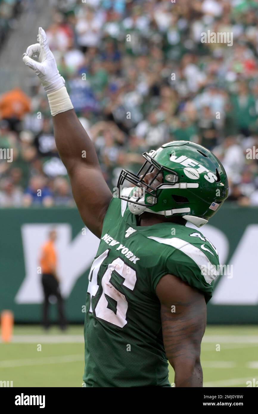 New York Jets linebacker Neville Hewitt (46) reacts during the first ...