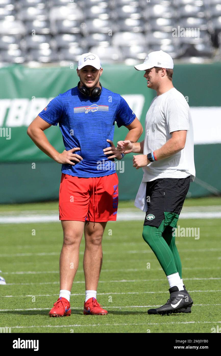 New York Jets quarterback Sam Darnold, right, talks with Buffalo Bills ...