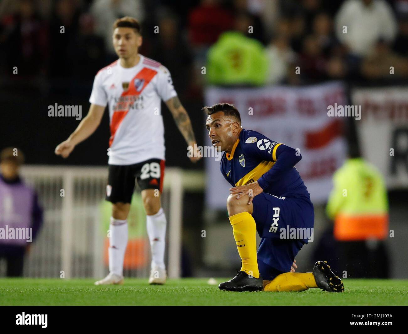 Goalkeeper Esteban Andrada of Argentina's Boca Juniors kneels during a ...