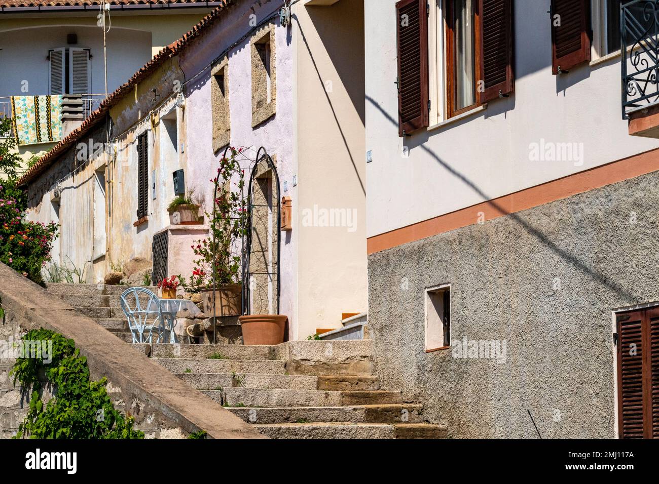 Stepped Entrance to Traditional Terraced, Houses With Table and Chair ...