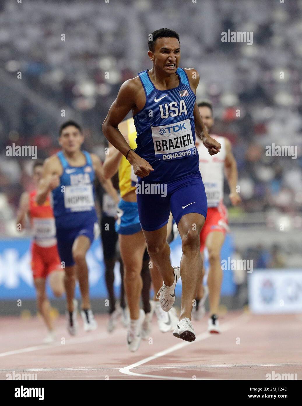 Donavan Brazier, of the U.S., crosses the line to win the gold in the ...