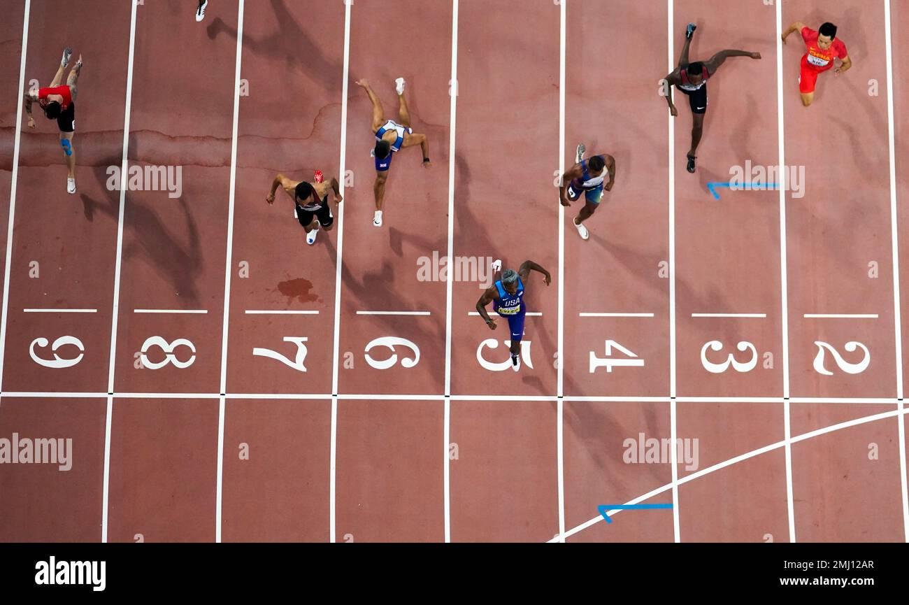 Noah Lyles of the United States crosses the finish line to win the men ...