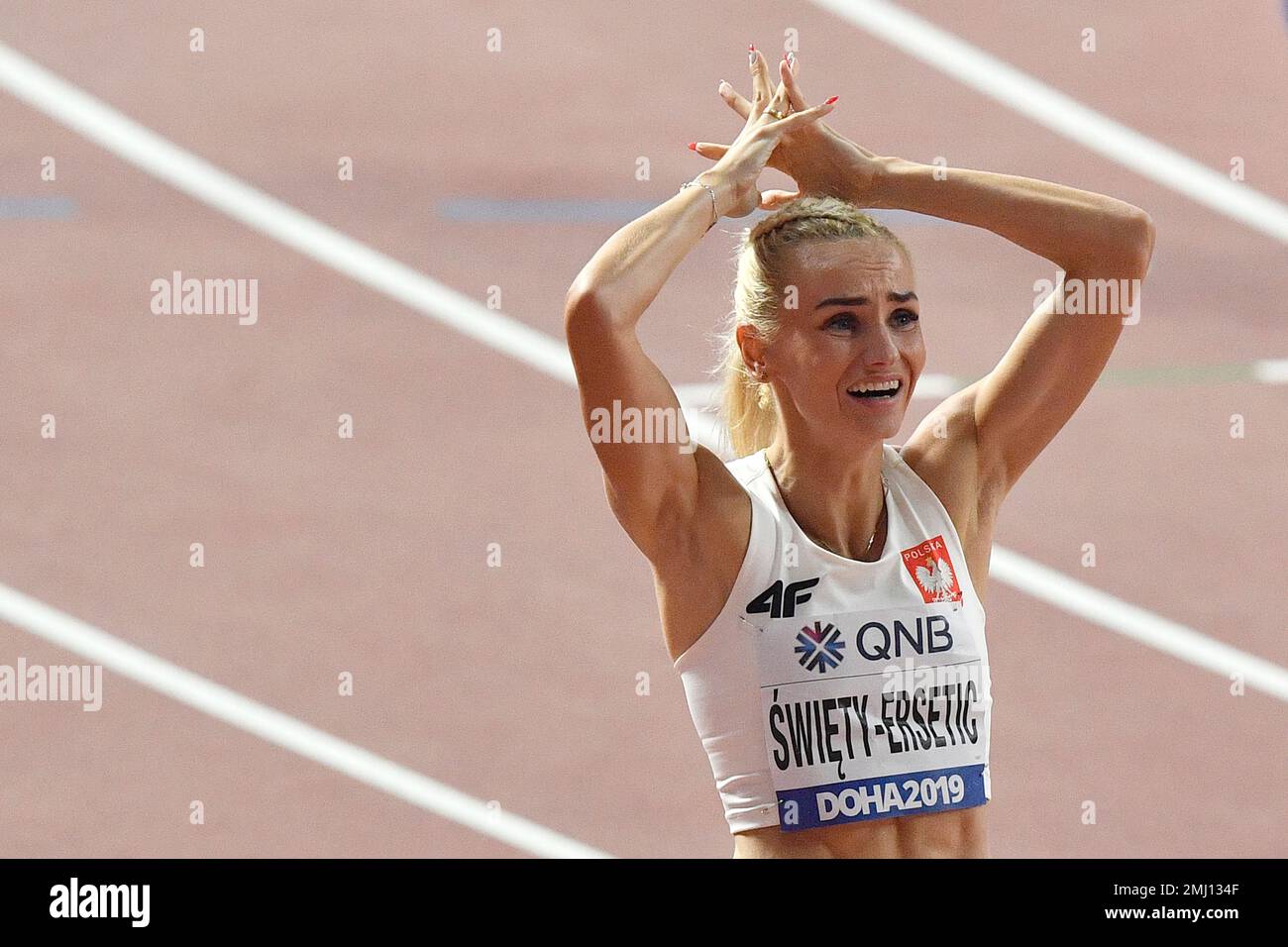 Justyna Swiety-Ersetic, of Poland, celebrates after competing in the ...