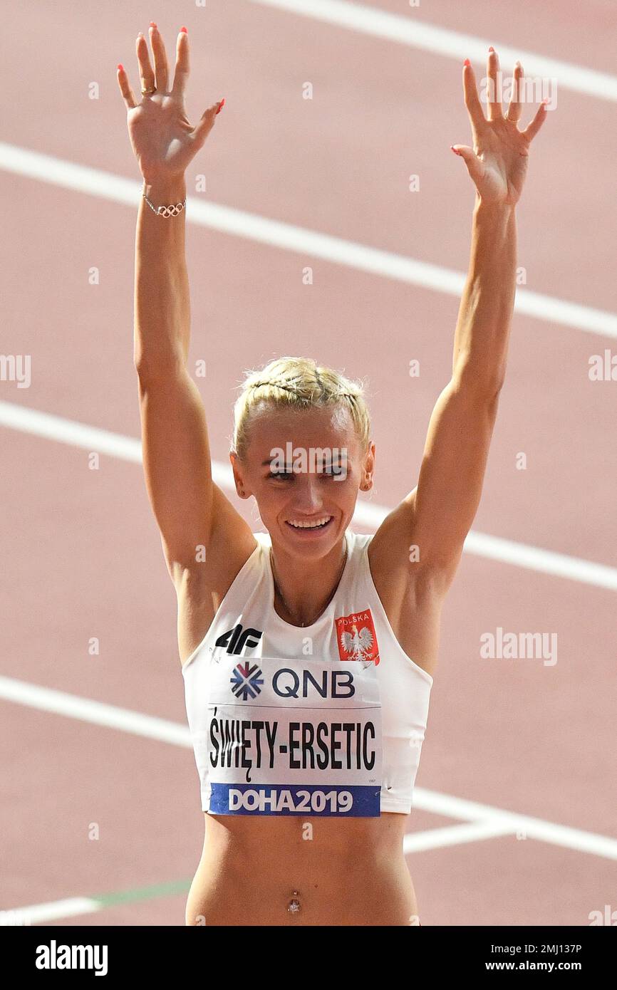 Justyna Swiety-Ersetic, of Poland, celebrates after competing in the ...