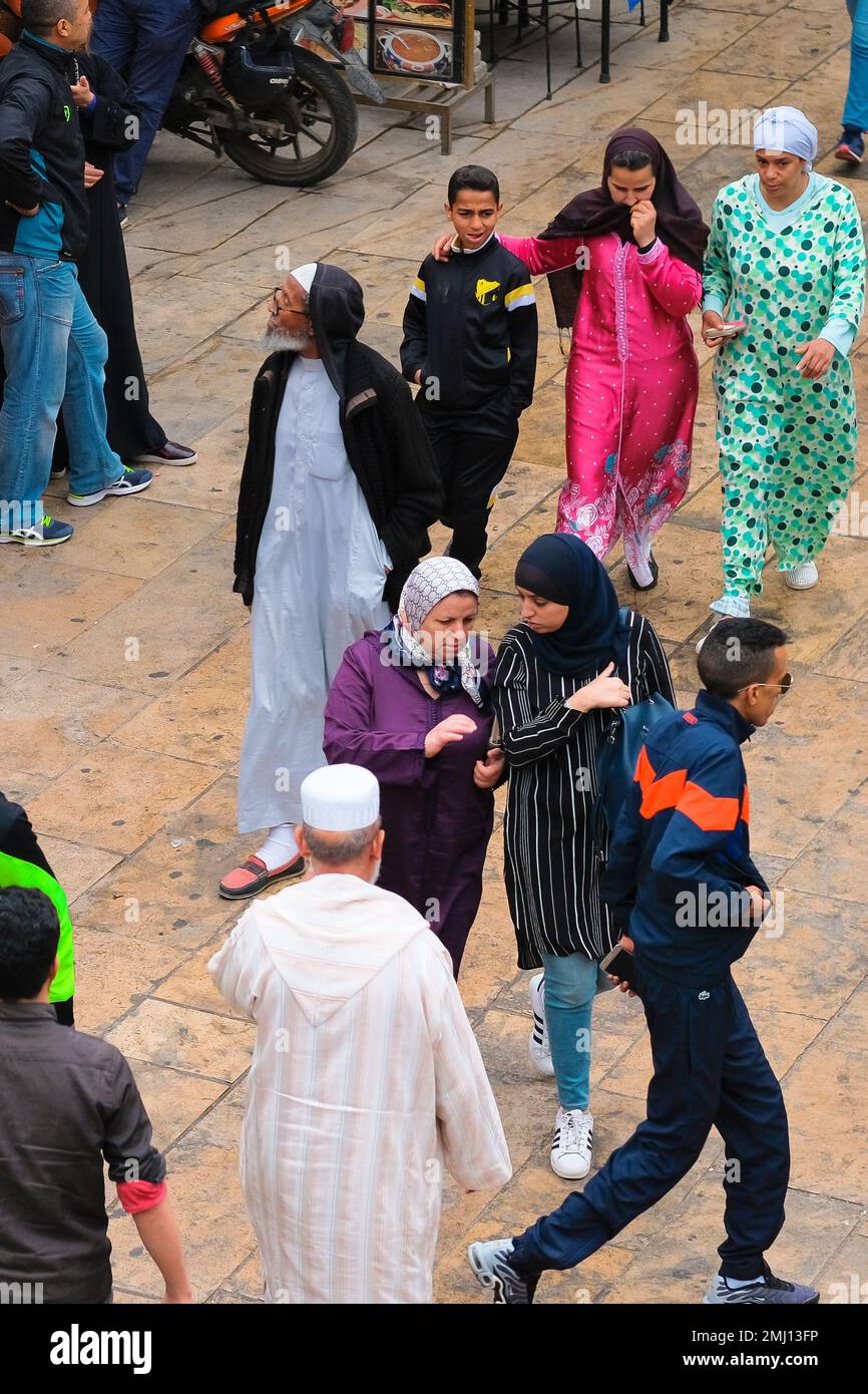 Fez, Morocco - covered muslim women and men in islamic attire walk in ...