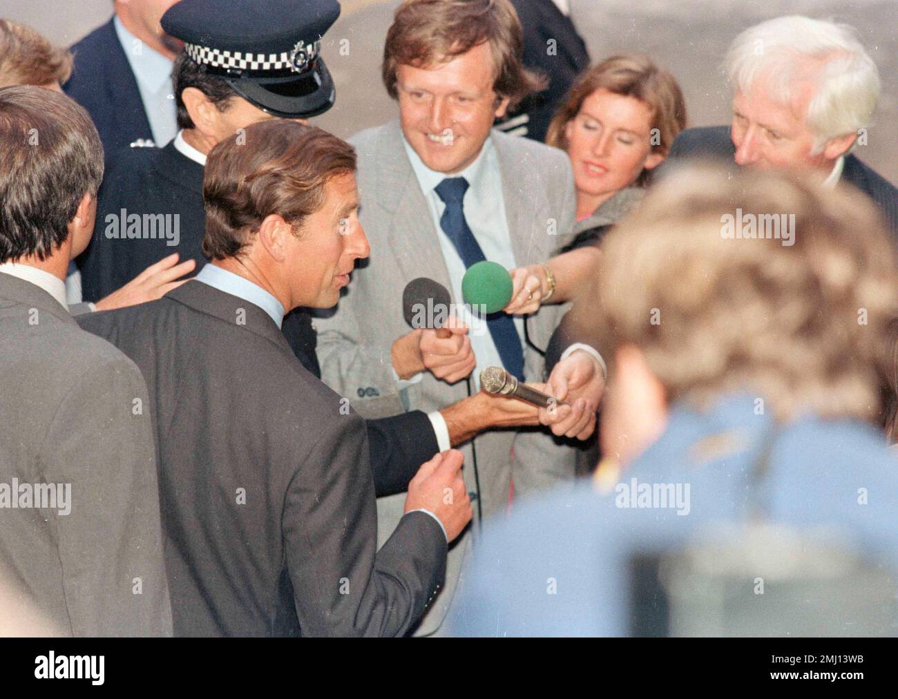 Prince Charles is surrounded by newsmen upon his arrival at St Mary's ...