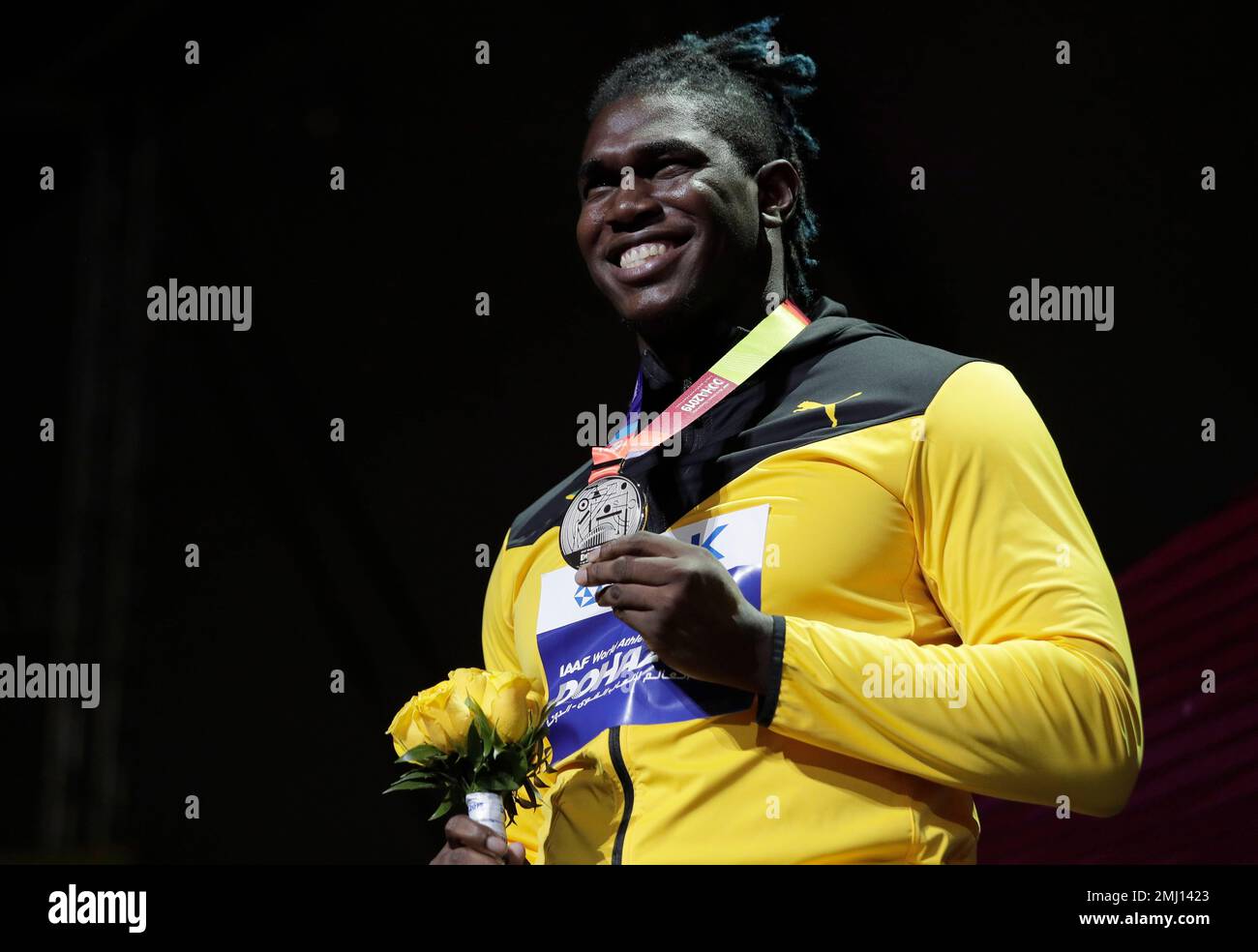 Fedrick Dacres, of Jamaica, silver medalist in the men's discus, poses ...