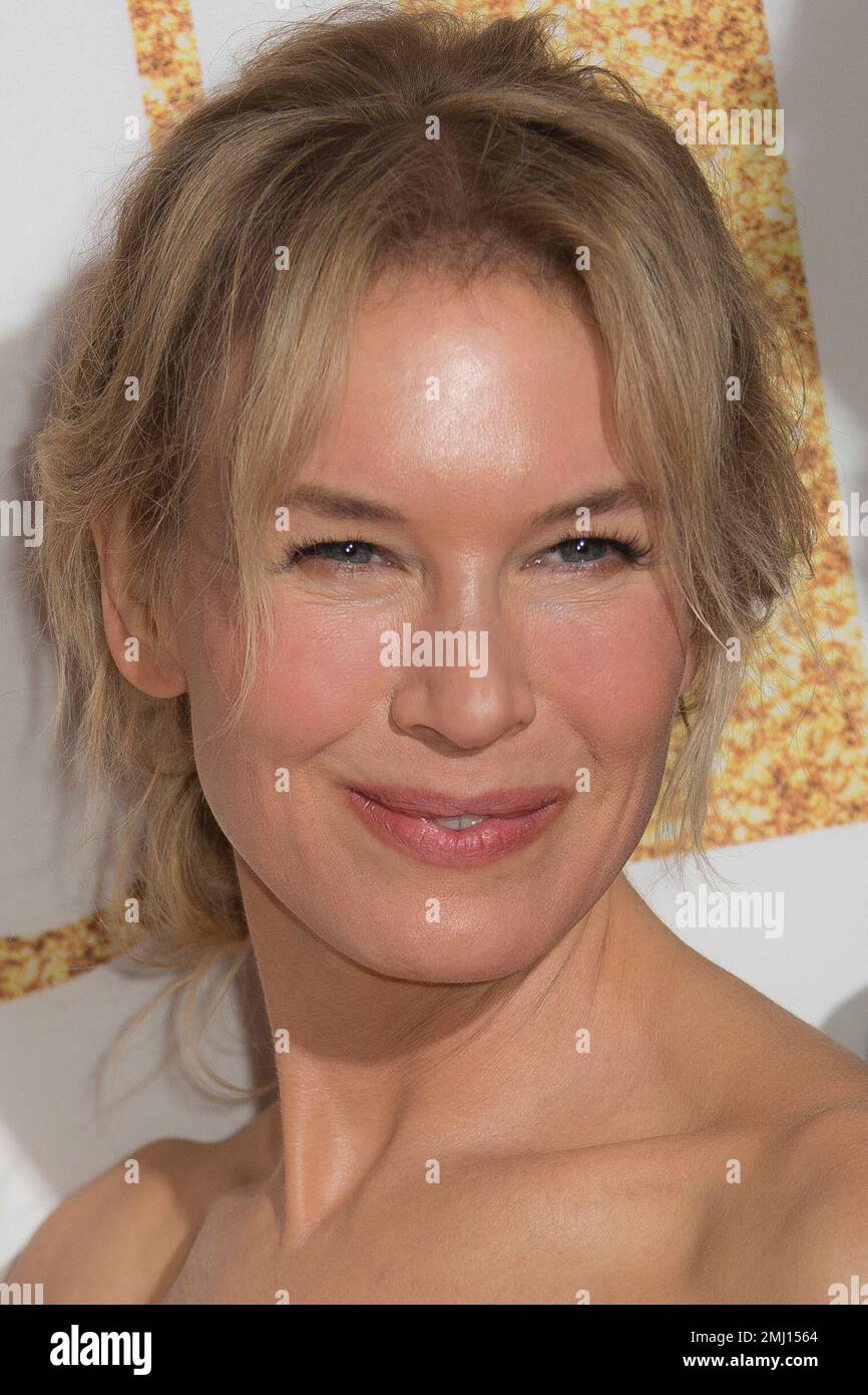 Actress Renee Zellweger poses for photographers upon arrival at the ...