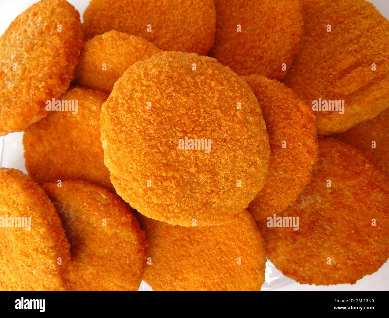 Clouseup background of fresh crispy fried fish cutlets Stock Photo - Alamy