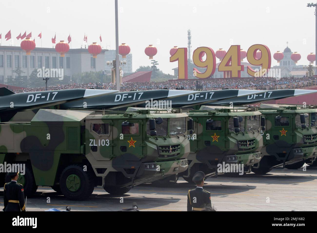 Chinese military vehicles carrying DF-17 roll during a parade to ...