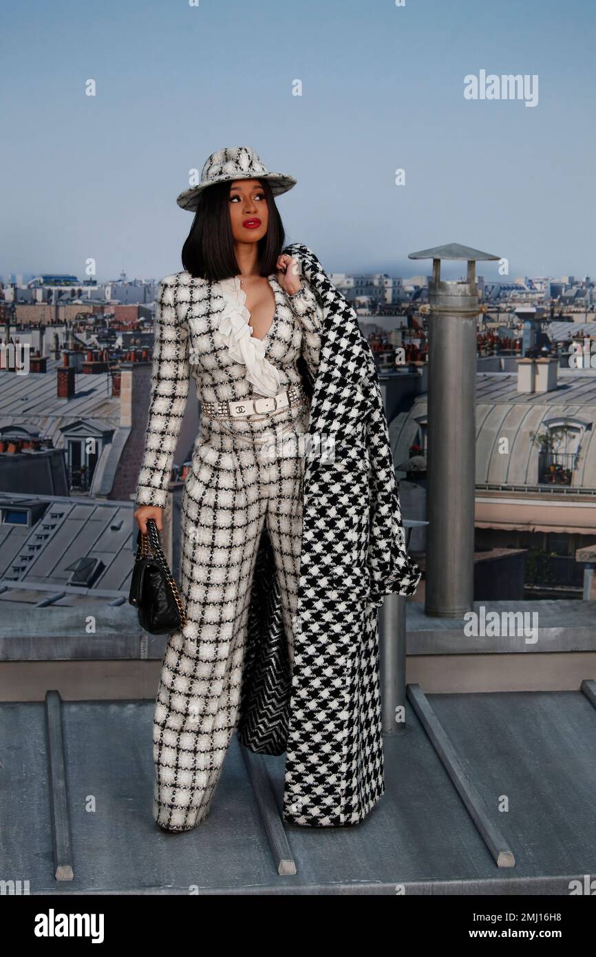 Singer Cardi B poses for photographers as she arrives for the Chanel ...