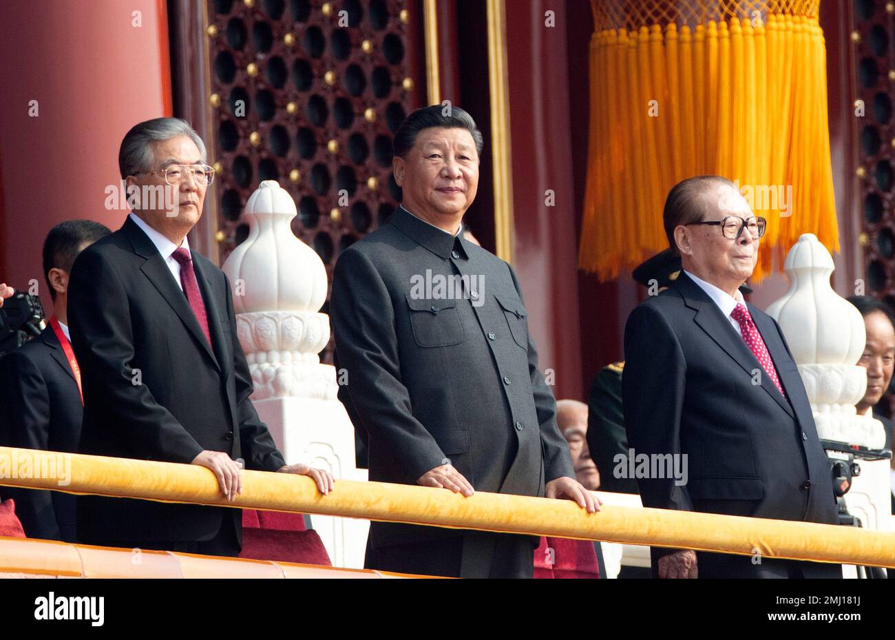 Chinese President Xi Jinping, center, with former presidents Jiang ...
