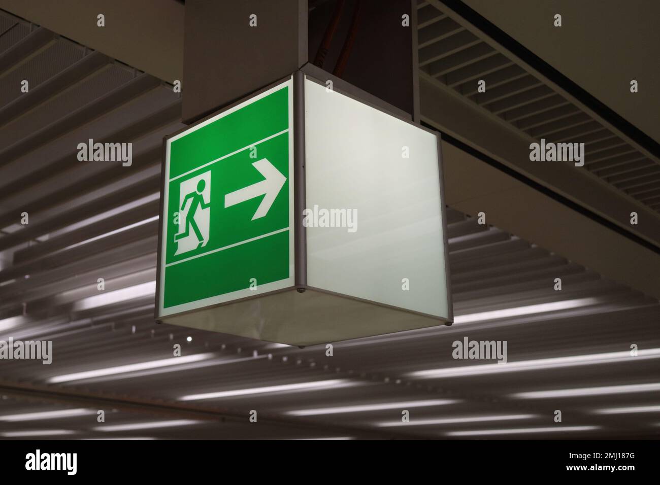 Escape Route Illuminated Sign Stock Photo - Alamy