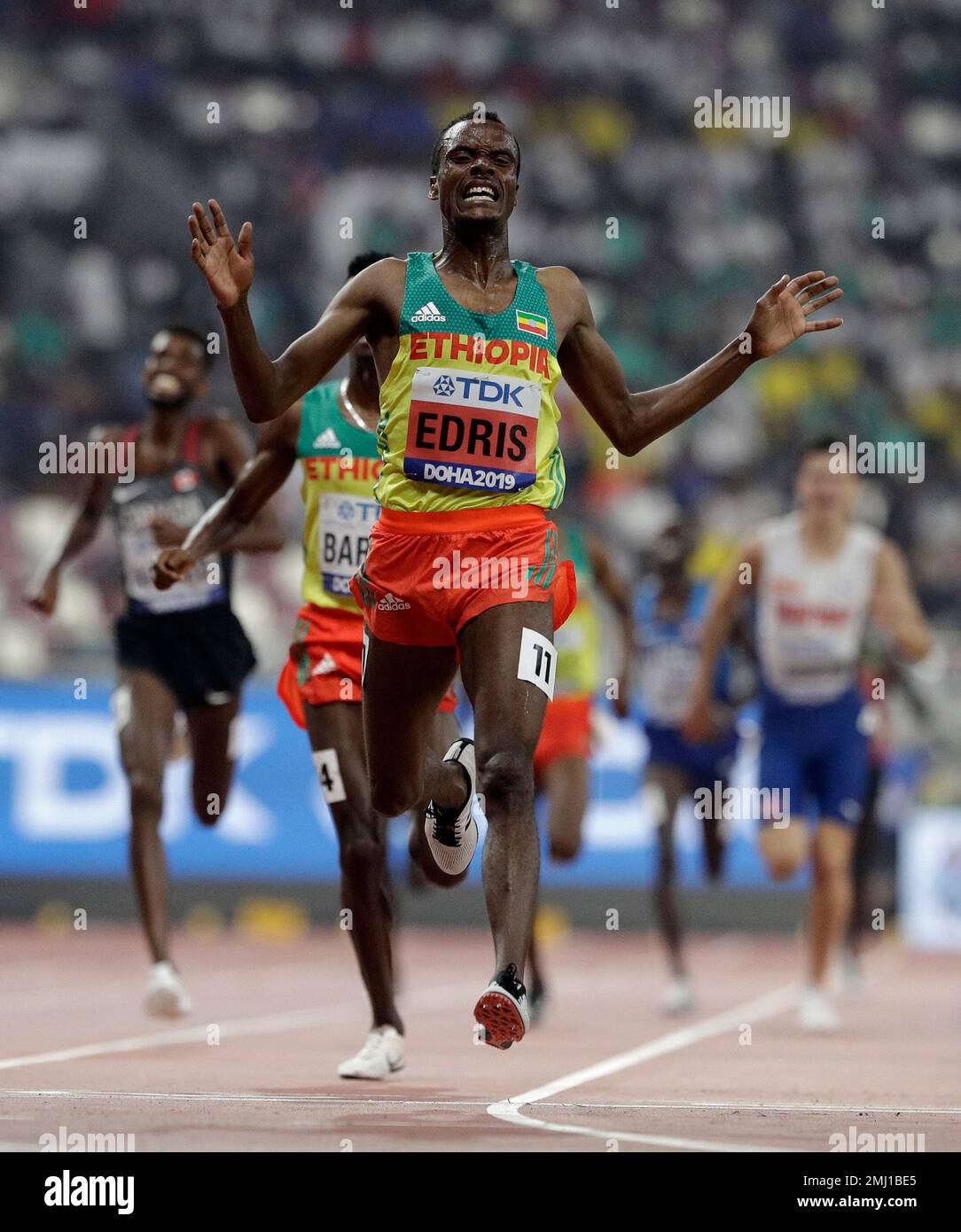 Muktar Edris, of Ethiopia wins the gold medal in the men's 5000 meter ...