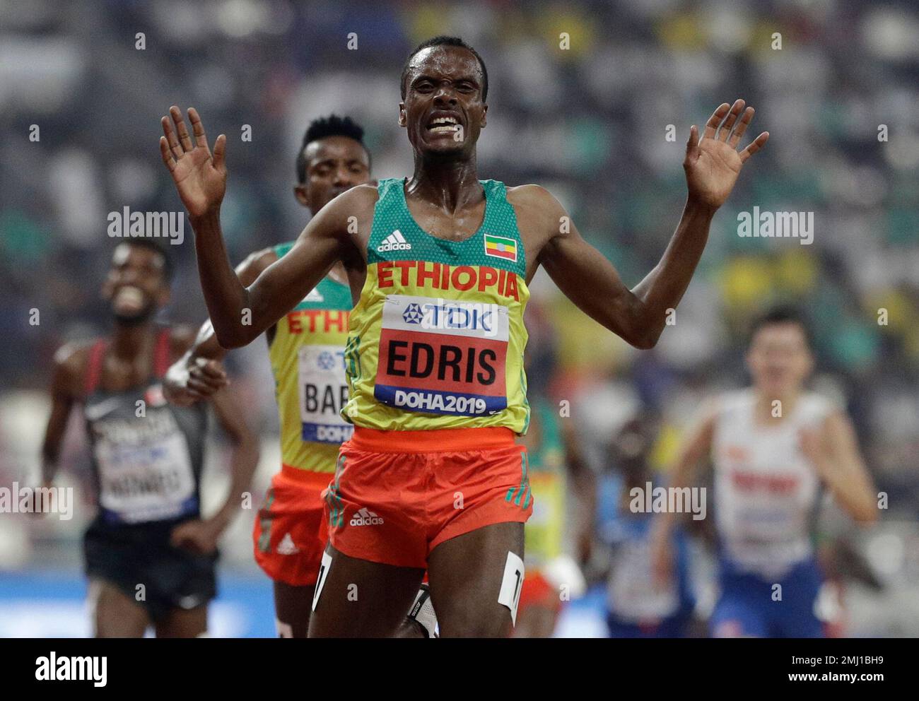 Muktar Edris, of Ethiopia wins the gold medal in the men's 5000 meter ...