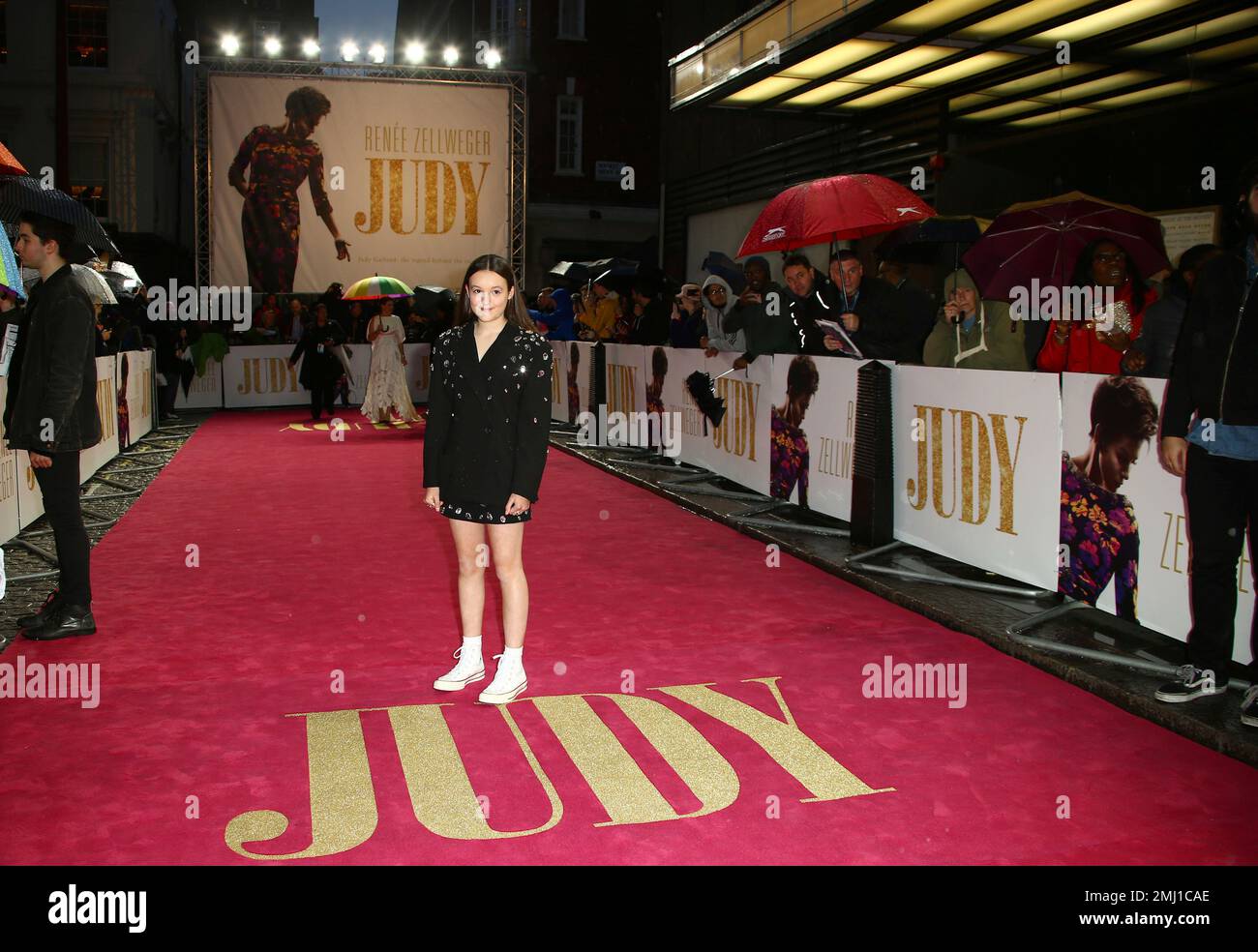 Actress Darci Shaw poses for photographers upon arrival at the premiere ...