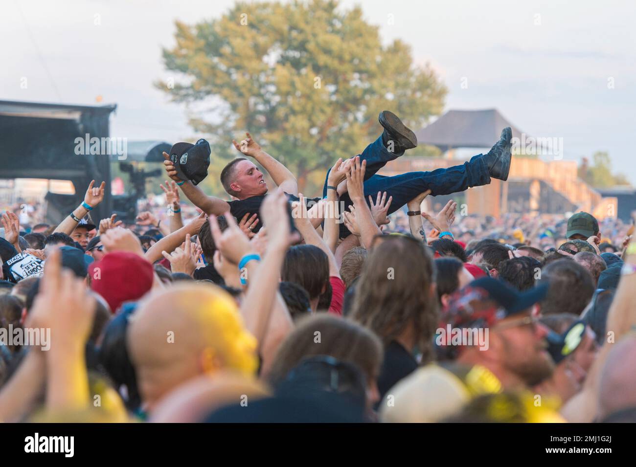 Festival goers crowd surf as Breaking Benjamin performs during Louder ...