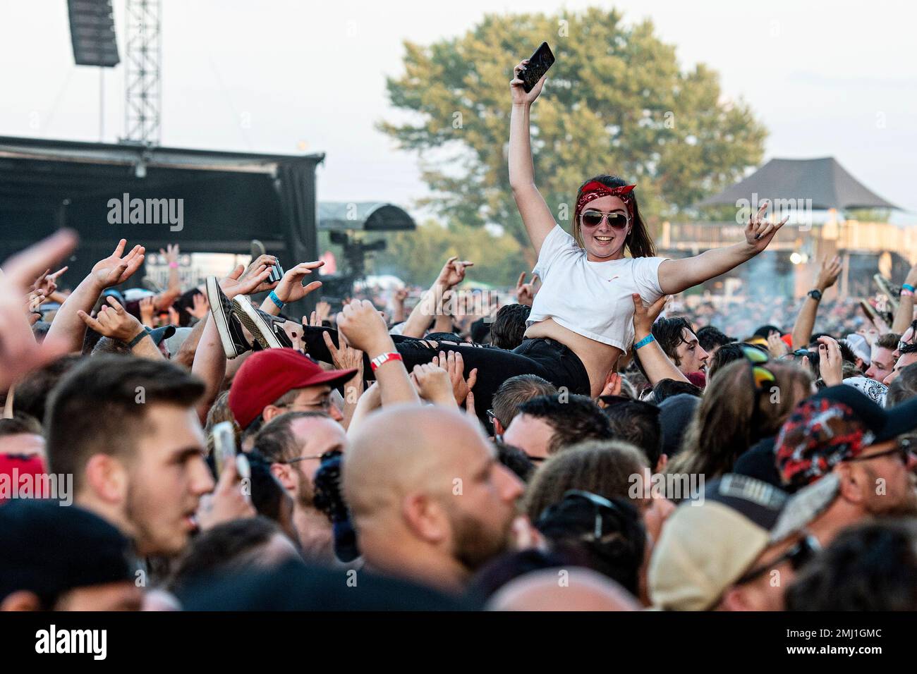 A festivalgoer crowd surfs as Breaking Benjamin performs during Louder ...