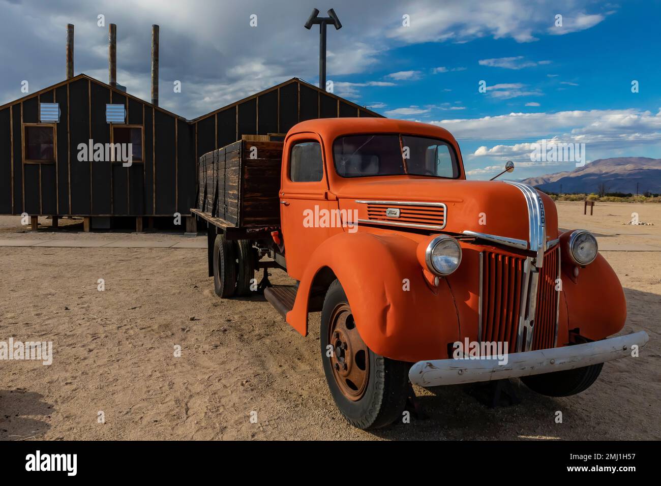 Old truck near reconstructed mess hall at Manzanar National Historic ...