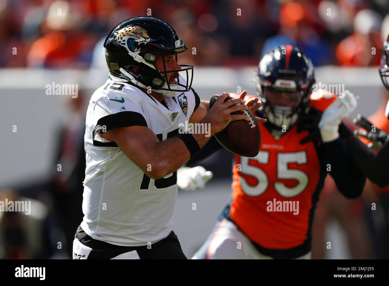 Jacksonville Jaguars quarterback Gardner Minshew scrambles under ...
