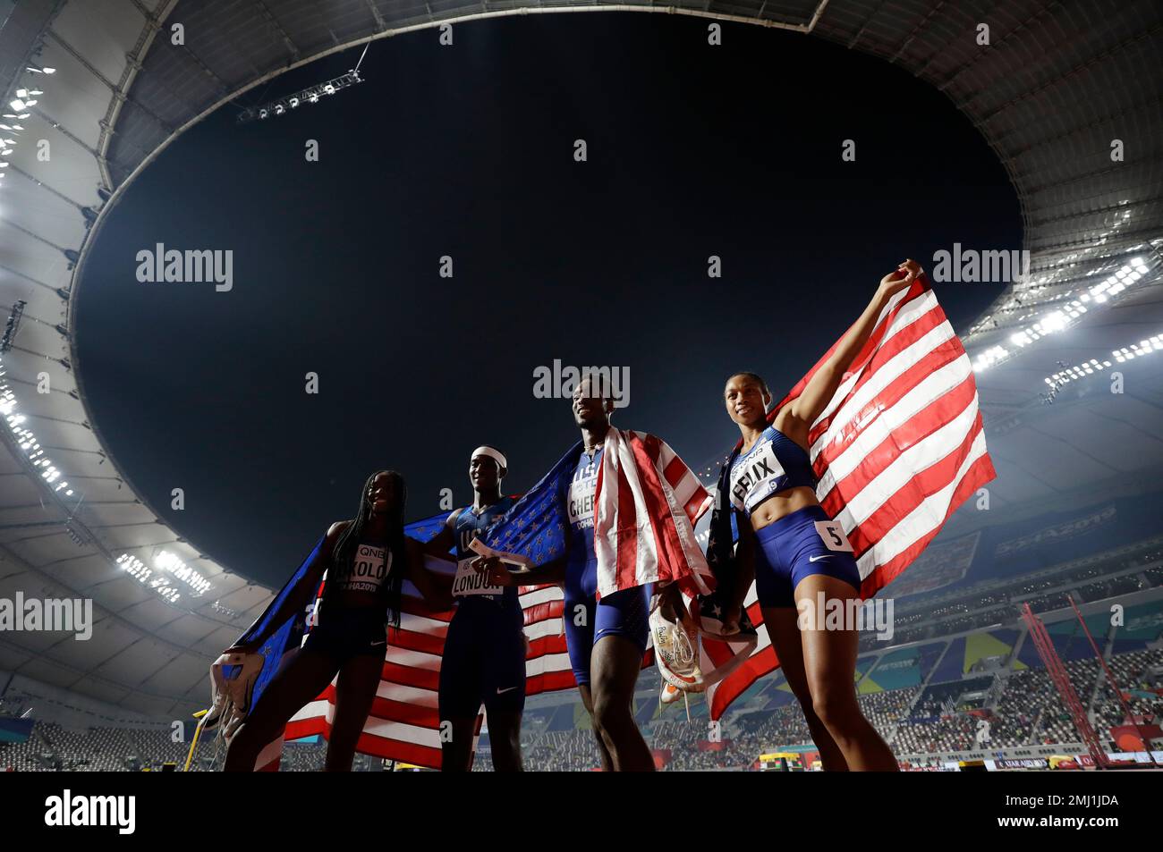 The United States team of Allyson Felix, Wilbert London, Michael Cherry ...