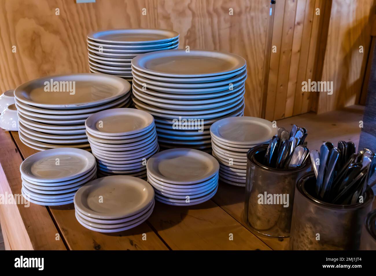 Plates stacked for dinner in a mess hall at Manzanar National Historic ...