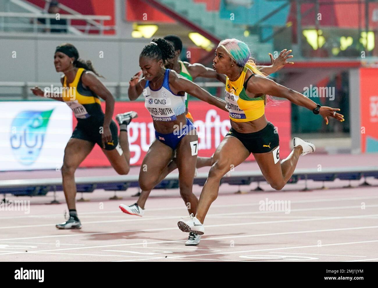 Shelly-Ann Fraser-Pryce, of Jamaica, right, finishes ahead of Dina ...
