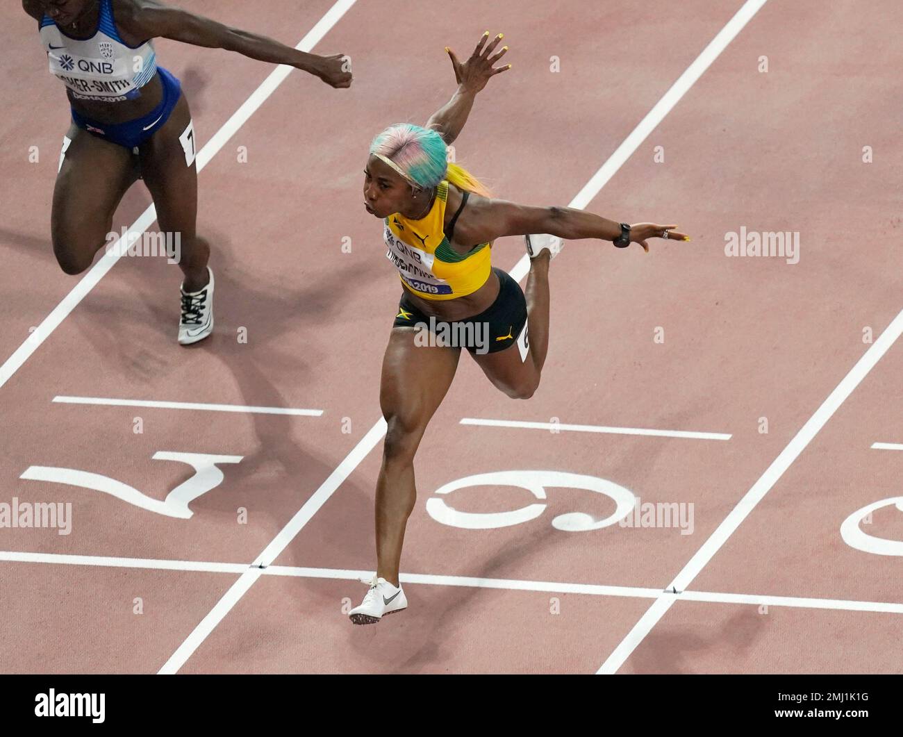 Shelly-Ann Fraser-Pryce, of Jamaica, wins the women's 100-meter dash at the World Athletics ...