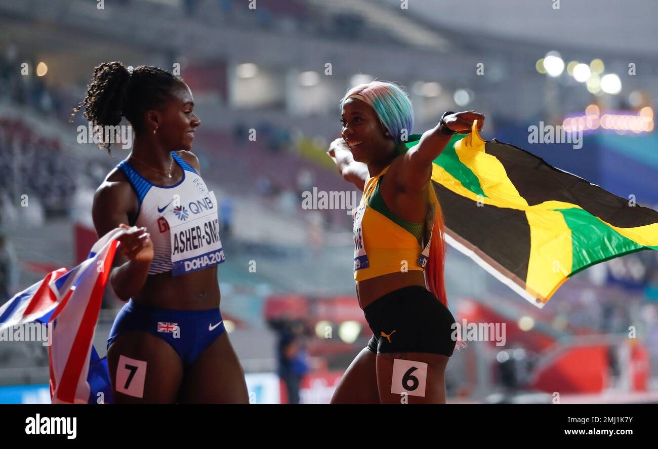 Shelly-Ann Fraser-Pryce, of Jamaica wins the gold medal in the women's 100 meter final ahead of ...