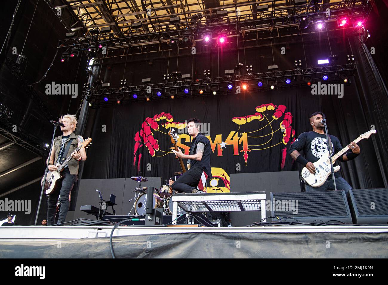 Deryck Whibley, from left, Jason McCaslin, and Dave Baksh of Sum 41 ...